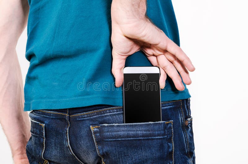 Mobile phone in a pocket stock image. Image of phone - 91611969