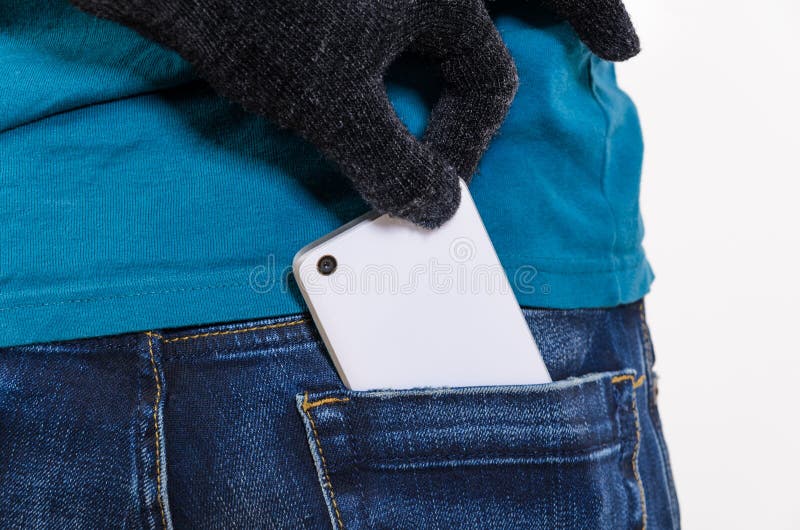 Mobile phone in a pocket stock image. Image of steal - 92088361