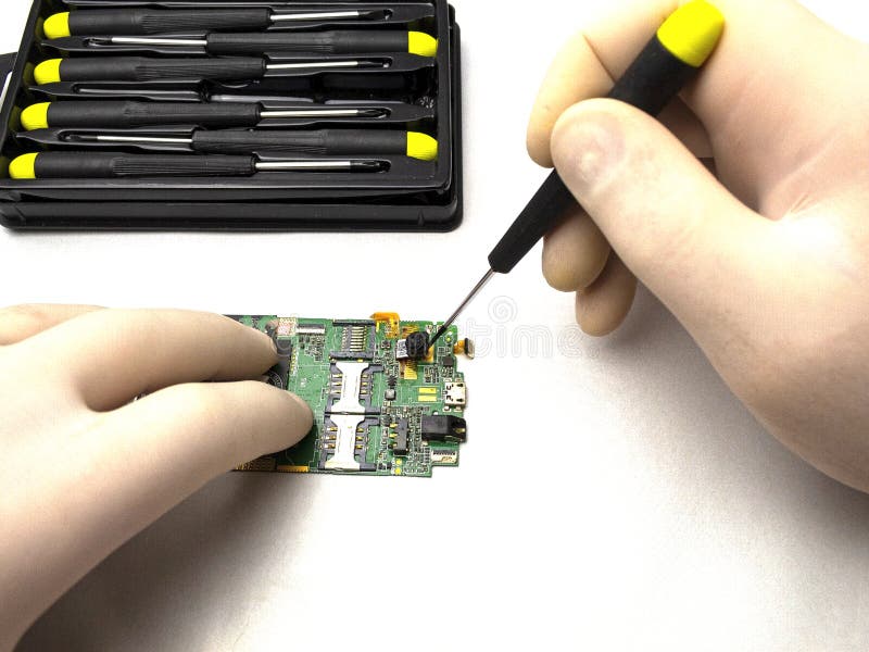 Mobile Phone Repair with Tester and Screwdriver Stock Photo - Image of ...