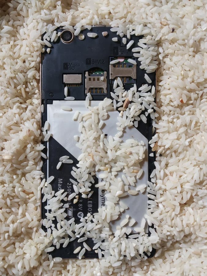 Mobile Phone in Rice with Battery Editorial Photography - Image of ...