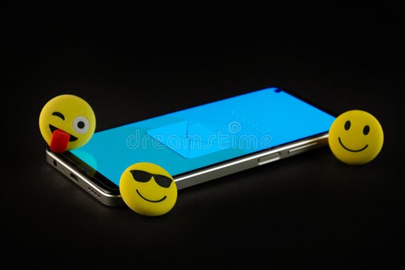 Mobile Phone with Smiley Faces and Emojis. Stock Photo - Image of ...