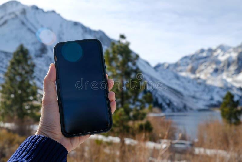 Mobile Phone and Snow Weather in the Mountain Stock Photo - Image of ...