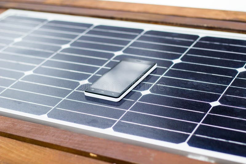 Mobile Phone on a Solar Panel Outdoor Close Up Stock Photo - Image of ...