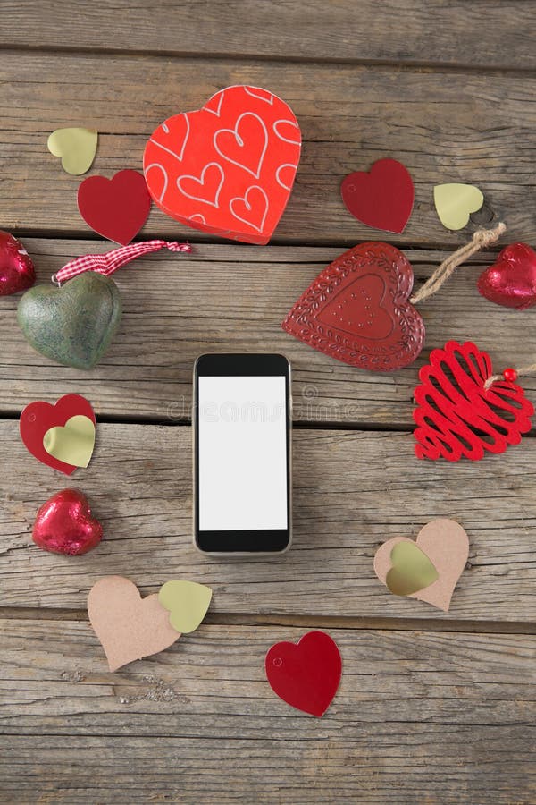 Mobile Phone Surrounded with Heart Shape Decoration Stock Image - Image ...