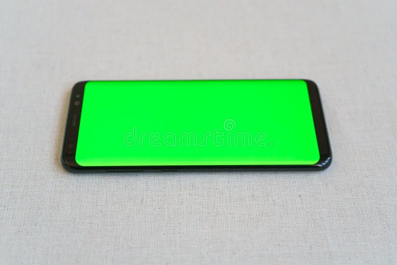 Mobile Phone on Table Horizontally with Blank Screen Stock Photo ...