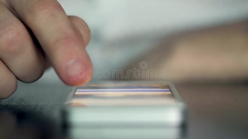 Mobile Phone on Table Pushed and Swiped by Finger Stock Video - Video ...
