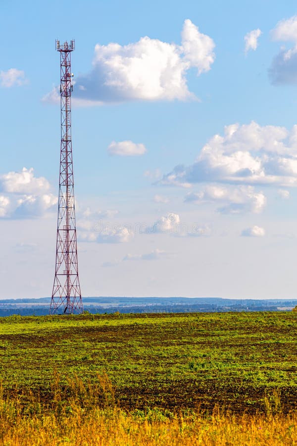 A Mobile Phone Tower Stands in a Field Outside the City Stock Photo ...