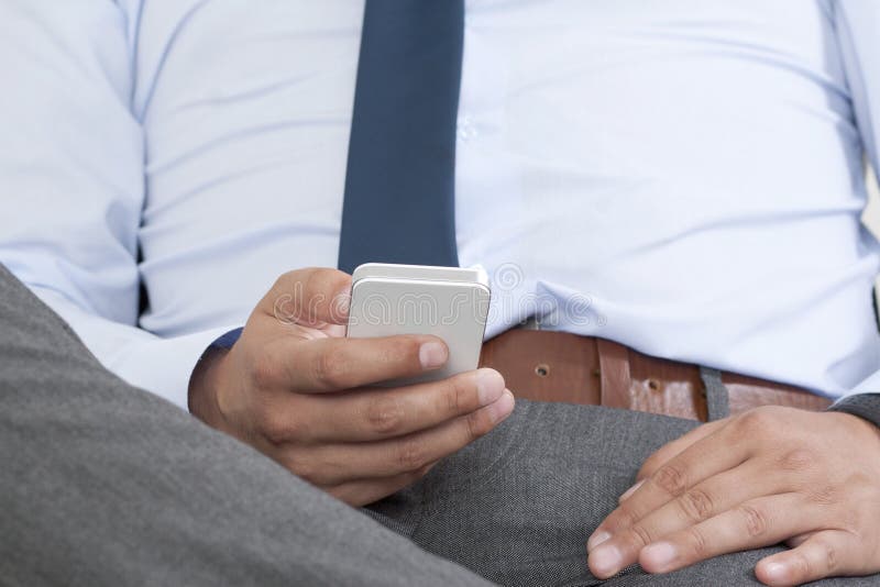 Mobile phone use stock photo. Image of businessman, office - 33989578