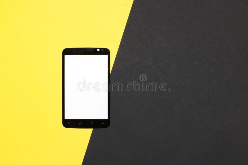 Mobile Phone with a White Display As Copy Space, on a Yellow-black ...