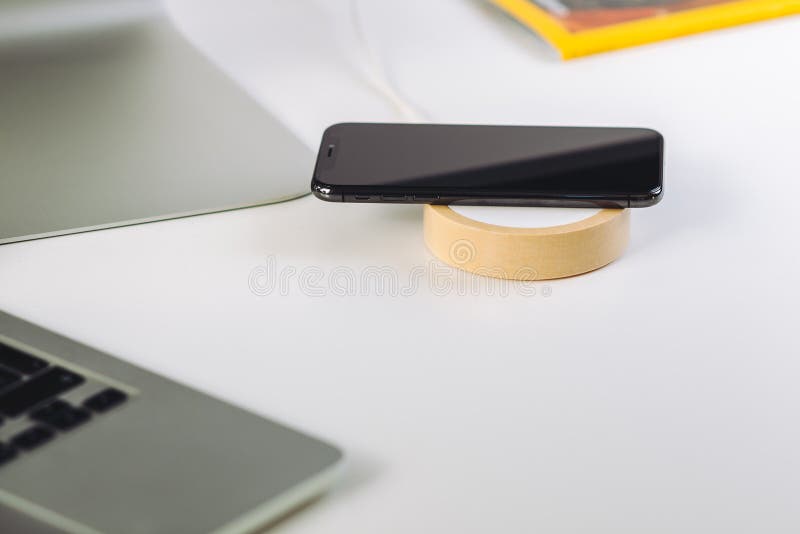 Mobile Phone and Wireless Charger on Office Table Stock Photo - Image ...