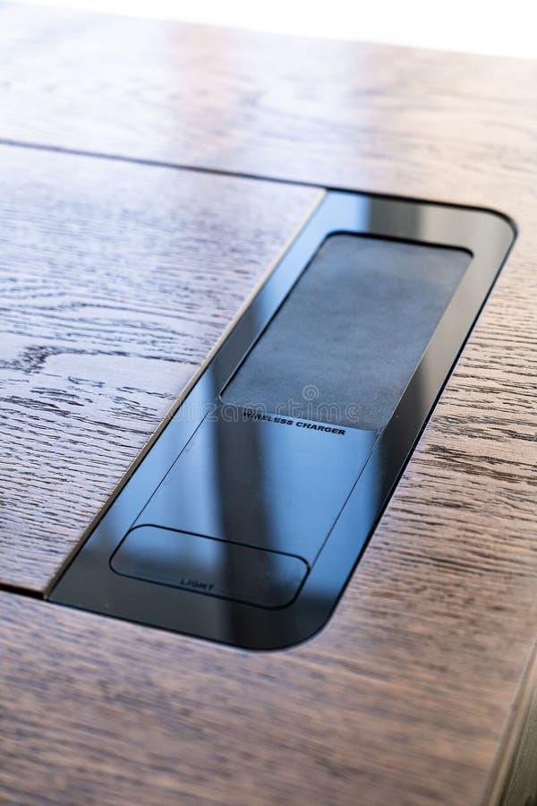 Mobile Phone with Wireless Charger on Table. Modern Workplace Accessory ...