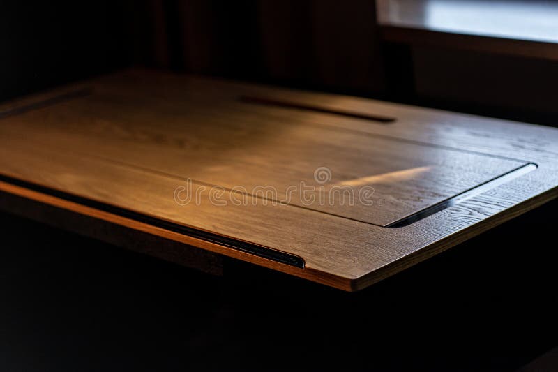Mobile Phone with Wireless Charger on Table. Modern Workplace Accessory ...
