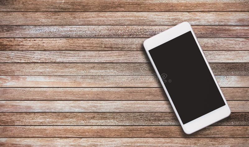 Mobile Phone is on a Wooden Plank Floor with Copy Space for Your Text ...