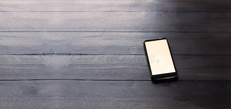Mobile Phone on a Wooden Table. White Clear Screen. Empty Table Stock ...