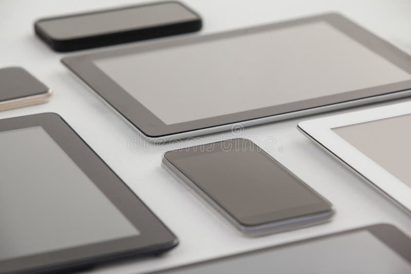 Mobile Phones and Digital Tablets on Table Stock Photo - Image of ...