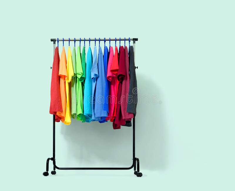 Mobile Rack with Color Clothes on Light Pink Background. File Contains ...