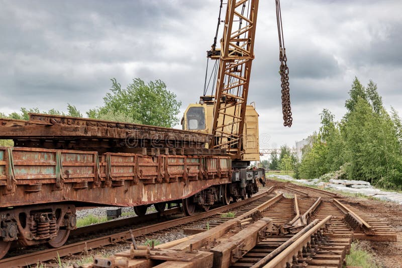 Mobile Railway Crane on a Platform. Replacement and Repair of Railroad ...