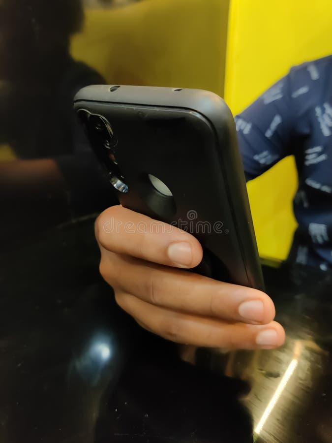 Mobile Smart Phone on a Boys Hand Closeup Stock Photo - Image of ...