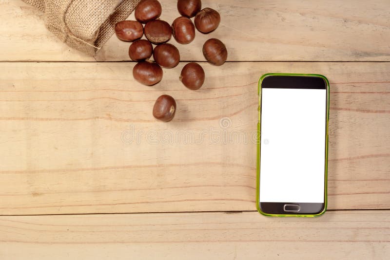 Mobile Smart Phone with Chestnut Stock Image - Image of closeup ...