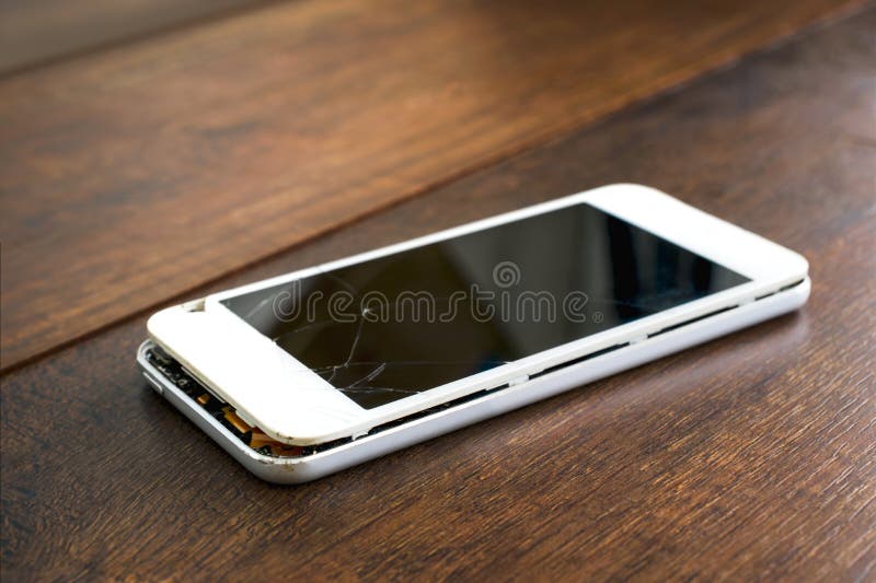 Mobile Smartphone with Body Broken, Screen Broken, on Wood Table Stock ...