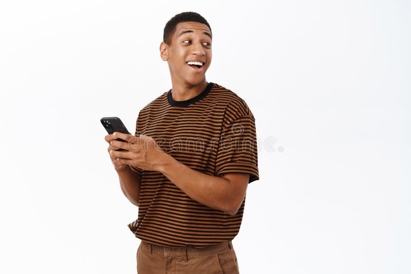Mobile Technology Concept. Smiling African American Man Using His ...