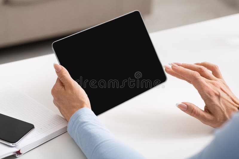 Mobile Technology for Remote Office. Female Hands Work with Tablet on ...