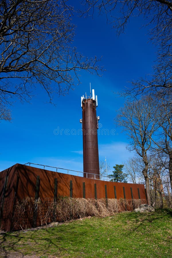 Mobile Telephone Base Tower and District Heating Funnel.. Stock Image ...