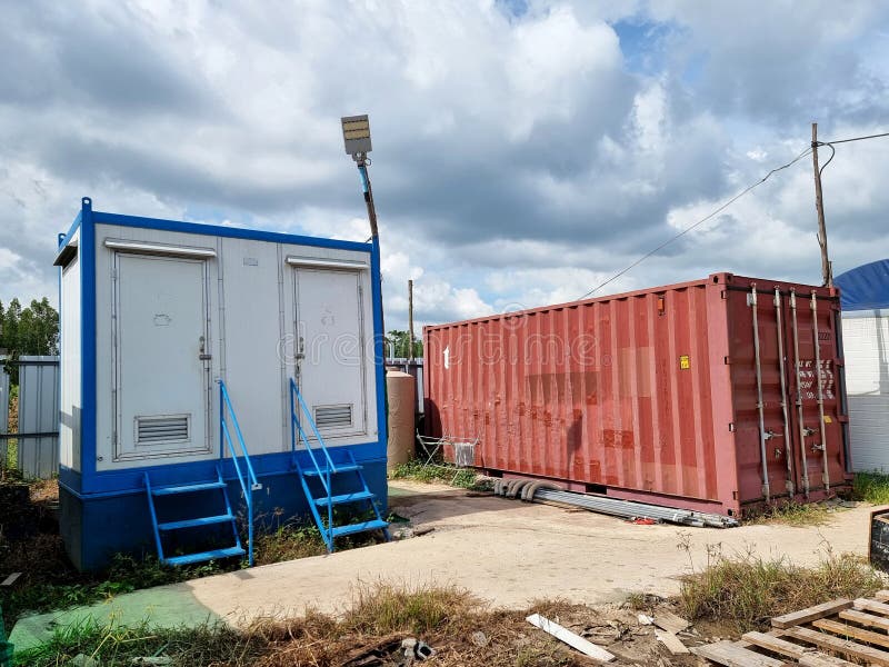 The Electrical Equipment Storage Container and HDPE Pipes Stock Photo ...