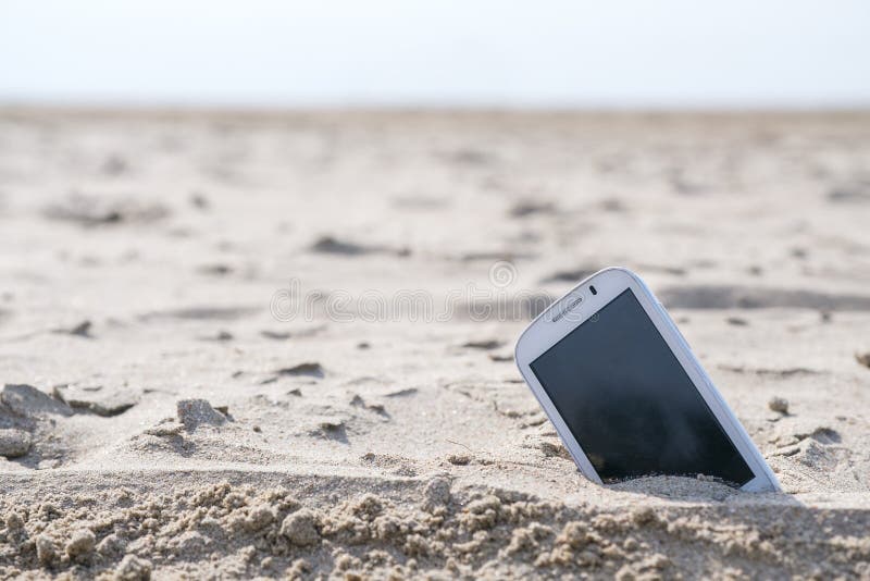 Mobile Touch Phone in Sand on Beach Stock Photo - Image of freedom ...