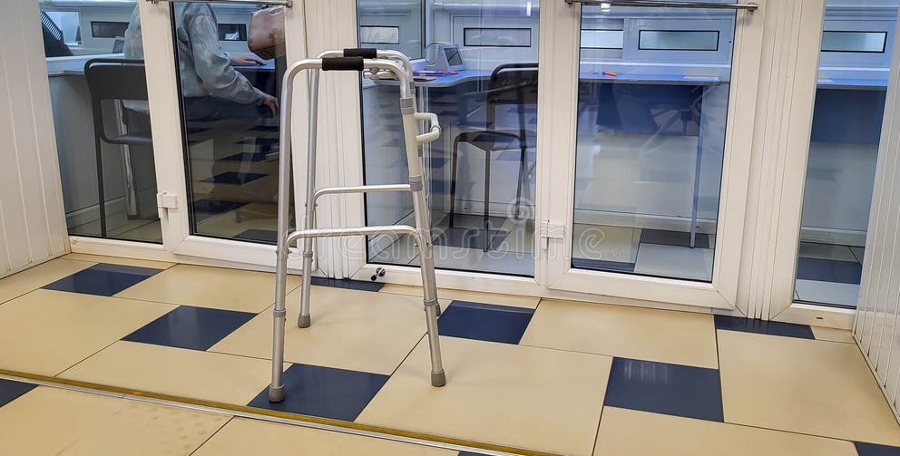 A Mobile Walking Frame with Rubber Gliders Stands in the Corridor Stock ...