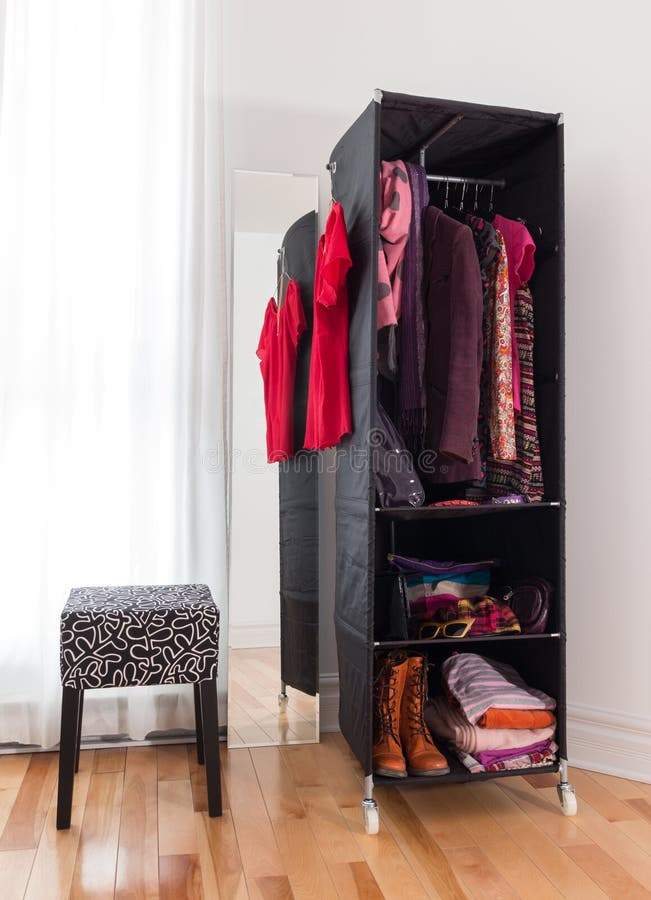 Mobile Wardrobe with Clothing and Shoes Stock Photo - Image of ...