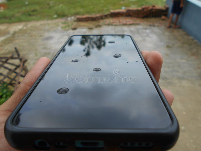 Mobile Water Drops by Digital Camera Stock Photo - Image of water ...