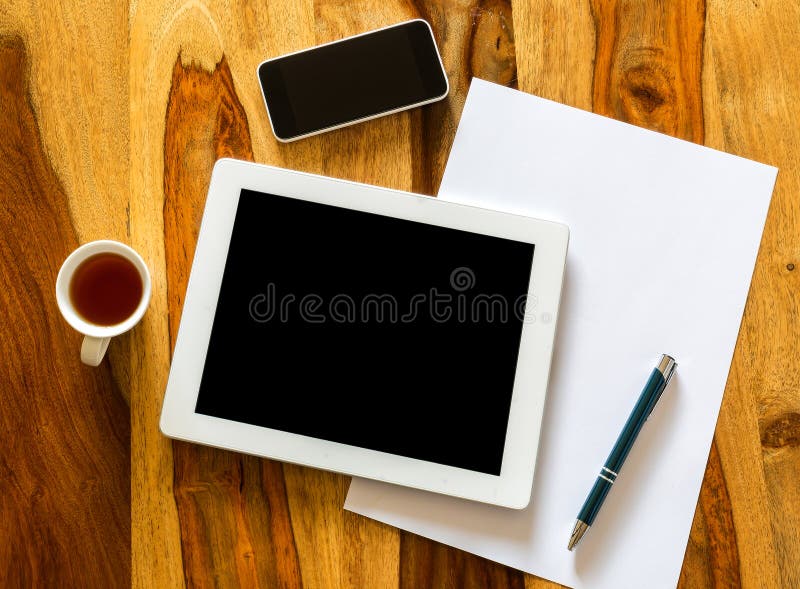 Mobile Workplace with a Tablet Pc, Phone and Cup of Tea Stock Image ...