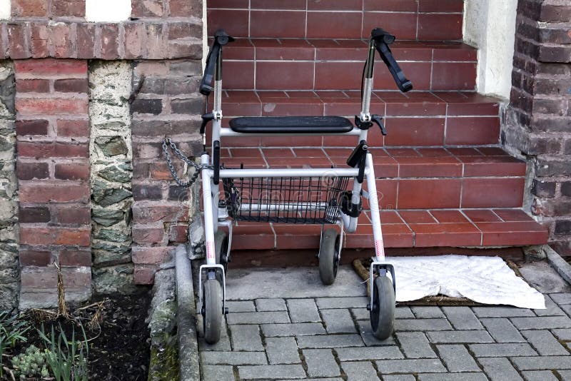 Mobility Walker Parked at the Bottom of Steps Stock Photo - Image of ...