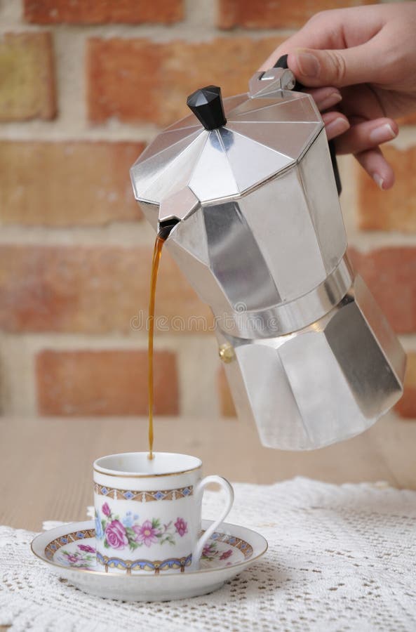 Mocca maker and cup. stock photo. Image of aluminum, wall - 17593792