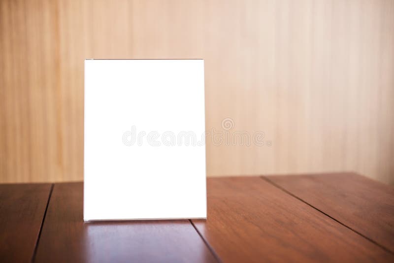 Mock Up Blank Menu Frame on Table in Coffee Shop Stand for Your Stock ...