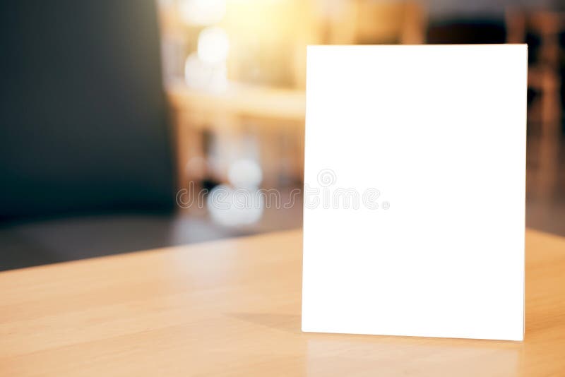 Mock Up Blank Menu Frame on Table in Coffee Shop Stand for Your Stock ...