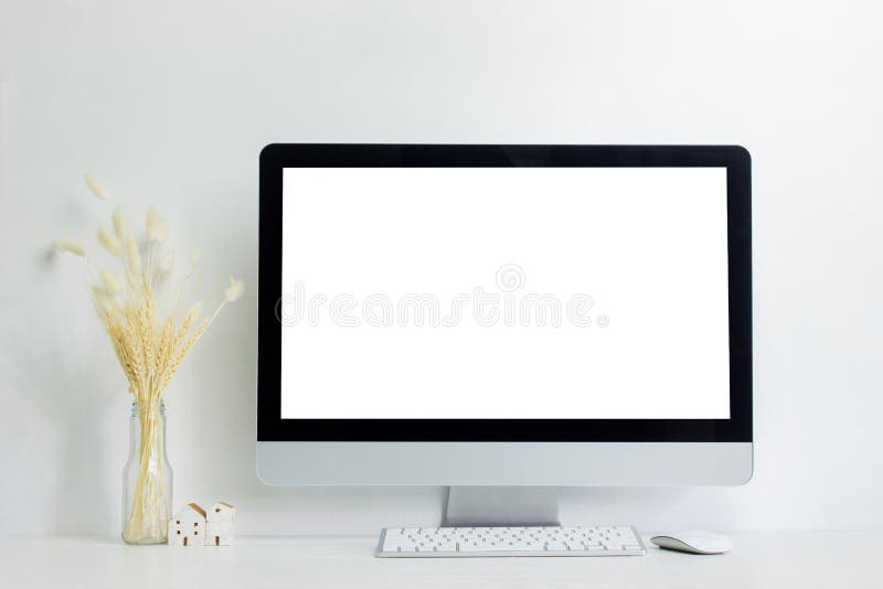 Mock Up Computer with White Flower and Mini House on Table. Stock Photo ...