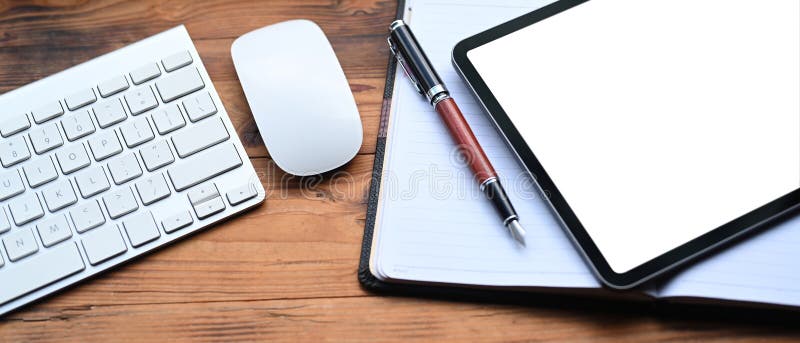 Digital Tablet, Notebook and Keyboard on Wooden Desk. Stock Photo ...