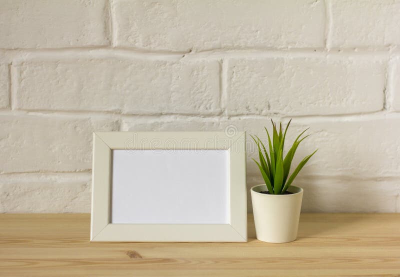 Mock Up Empty Photo Frame on Table or Shelf with Copy Space Stock Photo ...