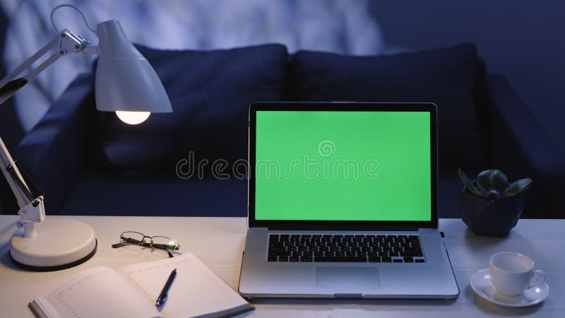 Mock-up Green Screen Laptop Standing on the Desk in the Modern Creative ...