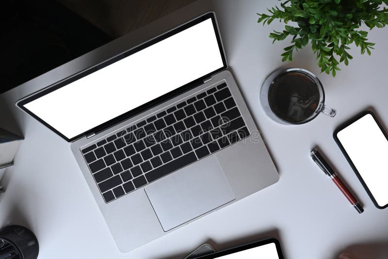Laptop Computer, Smart Phone and Coffee Cup on Office Desk. Stock Image ...