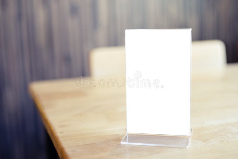 Mock Up Menu Frame Standing on Wood Table in Bar Restaurant Cafe. Space ...