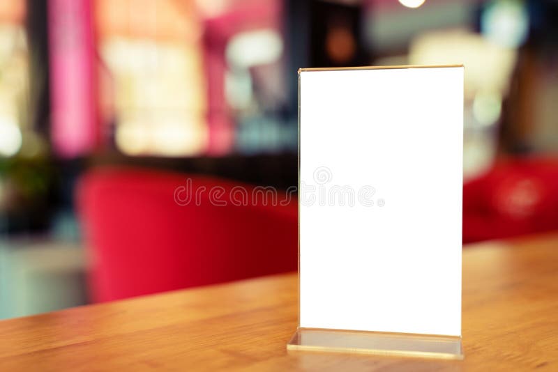 Mock Up Menu Frame Standing on Wood Table in Bar Restaurant Cafe. Space ...