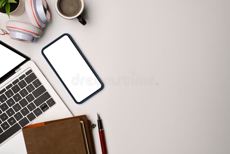 Mobile Phone, Laptop Computer, Coffee Cup and Book on White Office Desk ...