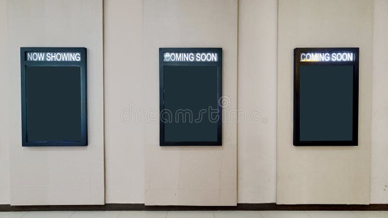 Three Mock Up Poster Frames on Cinema Wall Stock Photo - Image of ...