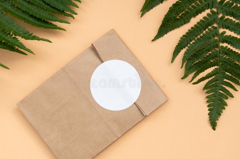 Round Sticker Mockup on Open Kraft Box, Lunch Box, Packaging with Blank ...