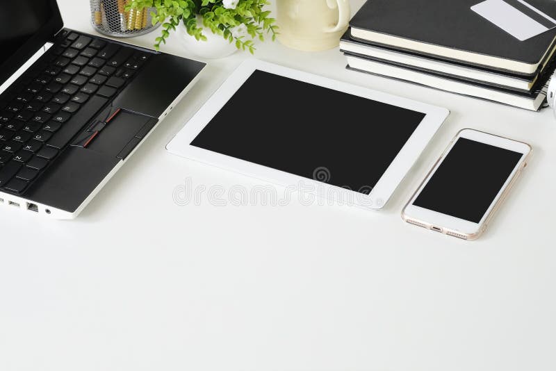 Mock Up Smartphone and Tablet with Laptop Computer on Workspace Stock ...