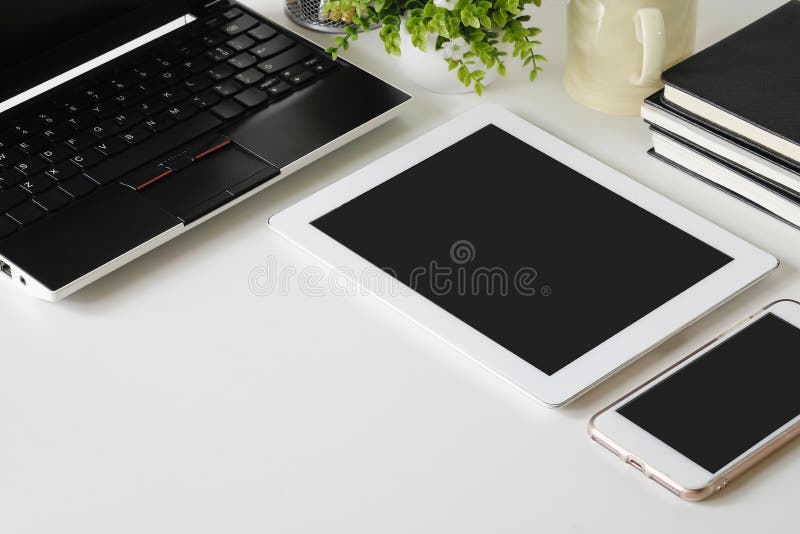 Mock Up Smartphone and Tablet with Laptop Computer on Workspace Stock ...