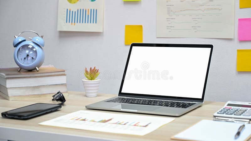 Mockup Blank Screen Laptop with Graph, Calculator, Smartphone on the ...